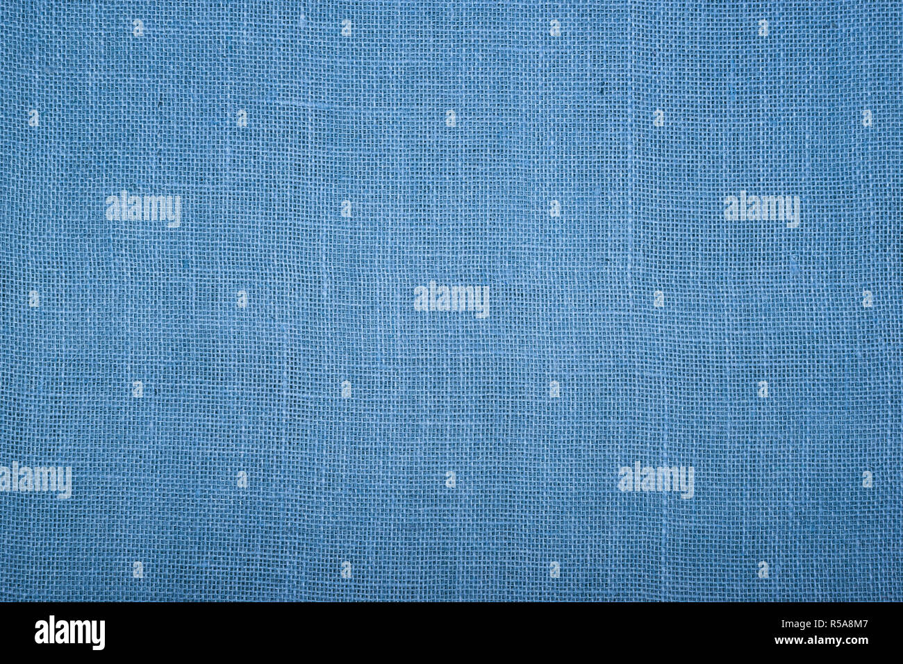 Blue burlap jute canvas texture background Stock Photo - Alamy