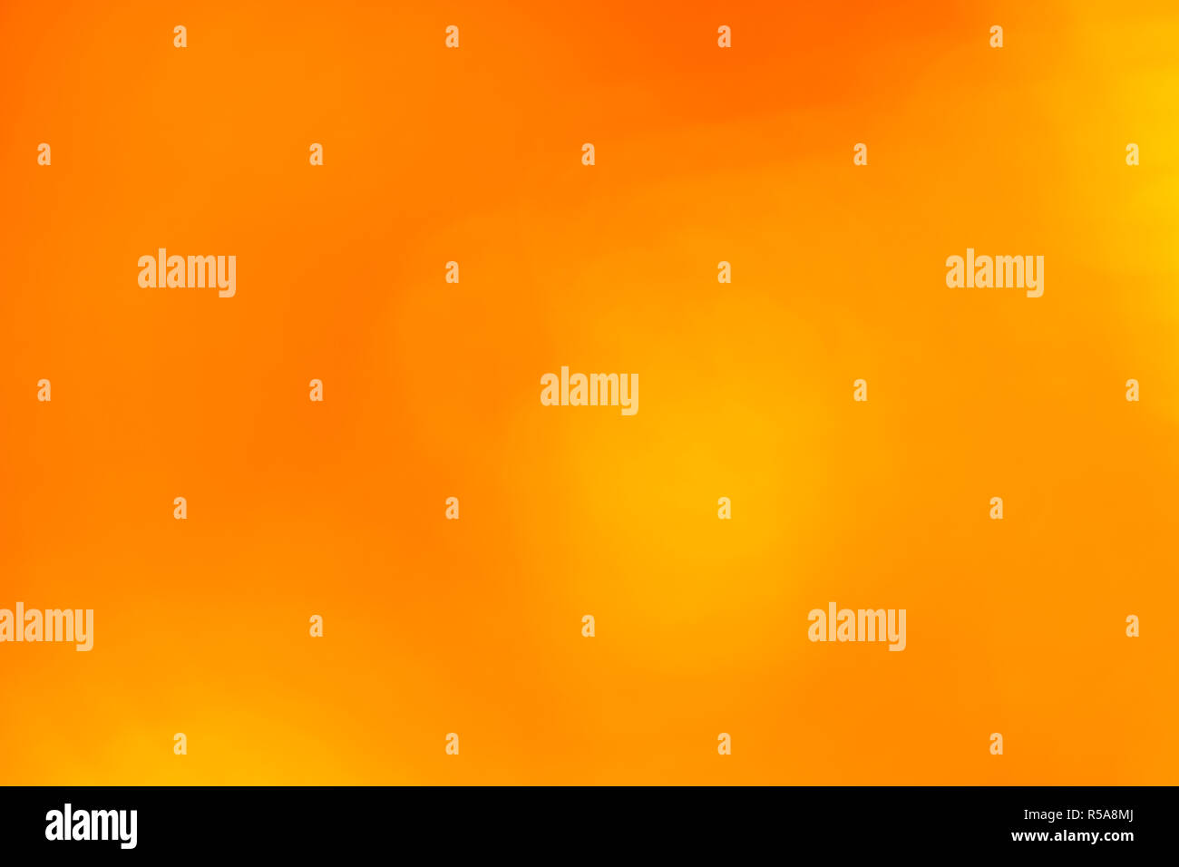 Orange abstract blur background with lens flare Stock Photo - Alamy