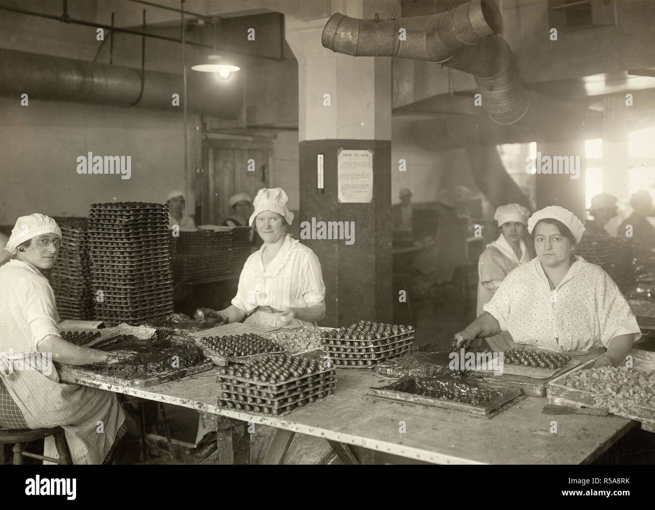 Making hand dipped chocolates hi-res stock photography and images - Alamy
