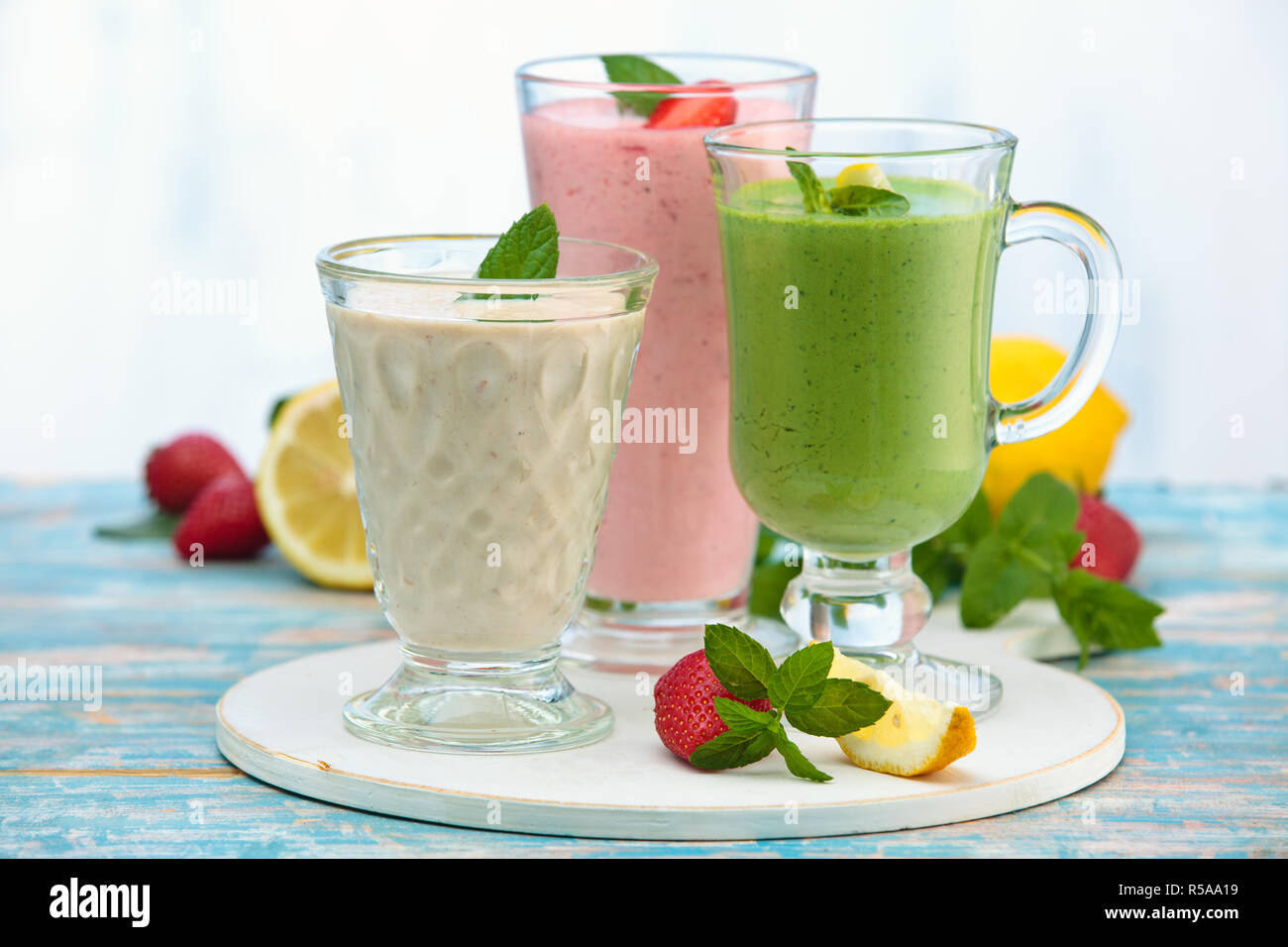Different milkshakes on the table Stock Photo - Alamy