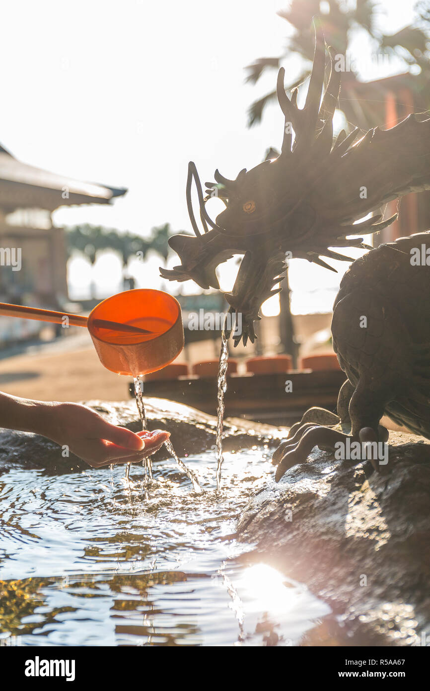 Washing hand in japanese temple Stock Photo - Alamy