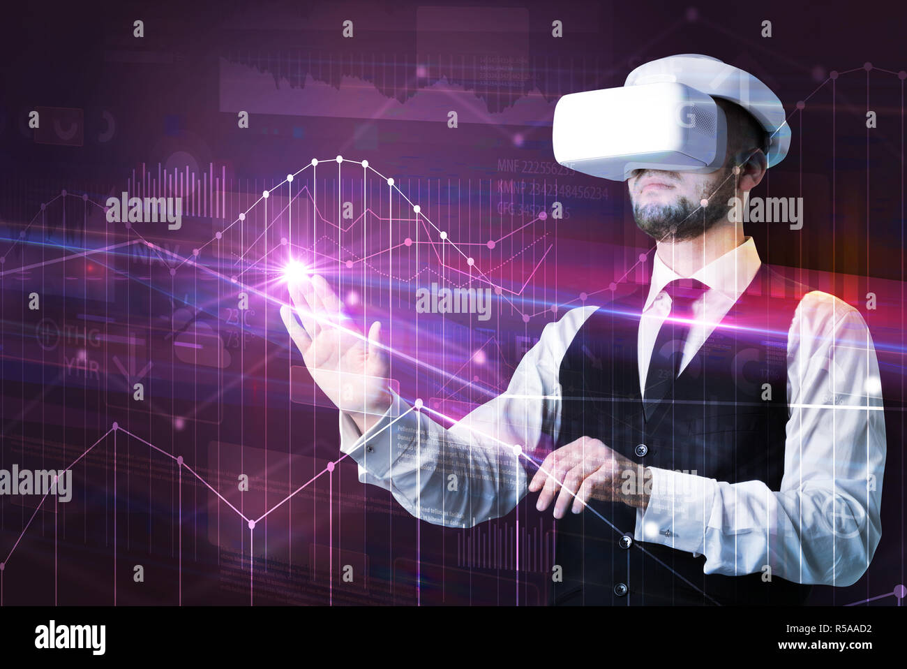 Businessman with virtual reality goggles organizing 3D graphs charts ...