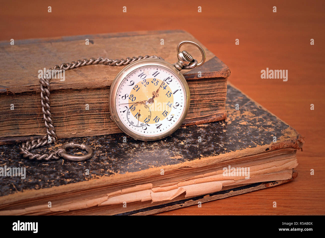 old clock and books Stock Photo - Alamy