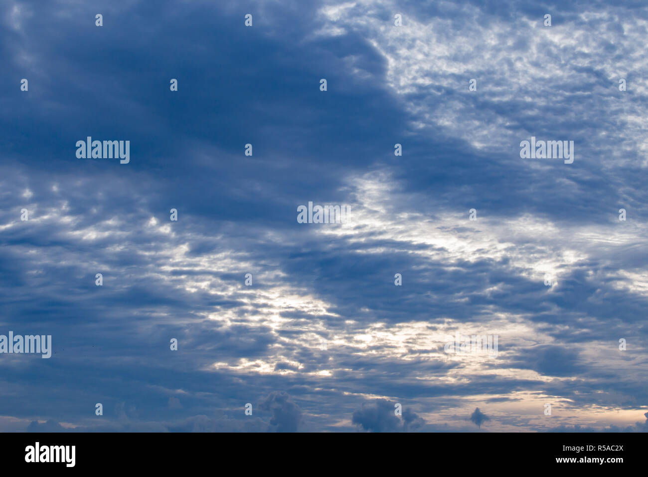 Gray storm clouds before sunset Stock Photo - Alamy