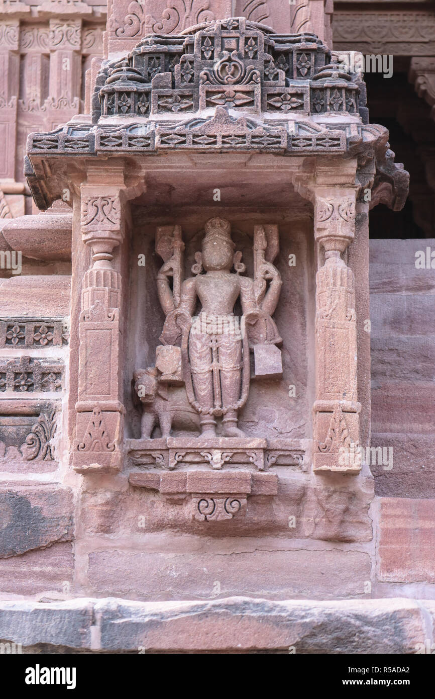 Sculpture of Hindu god in the wall of Mandore Temple Stock Photo - Alamy