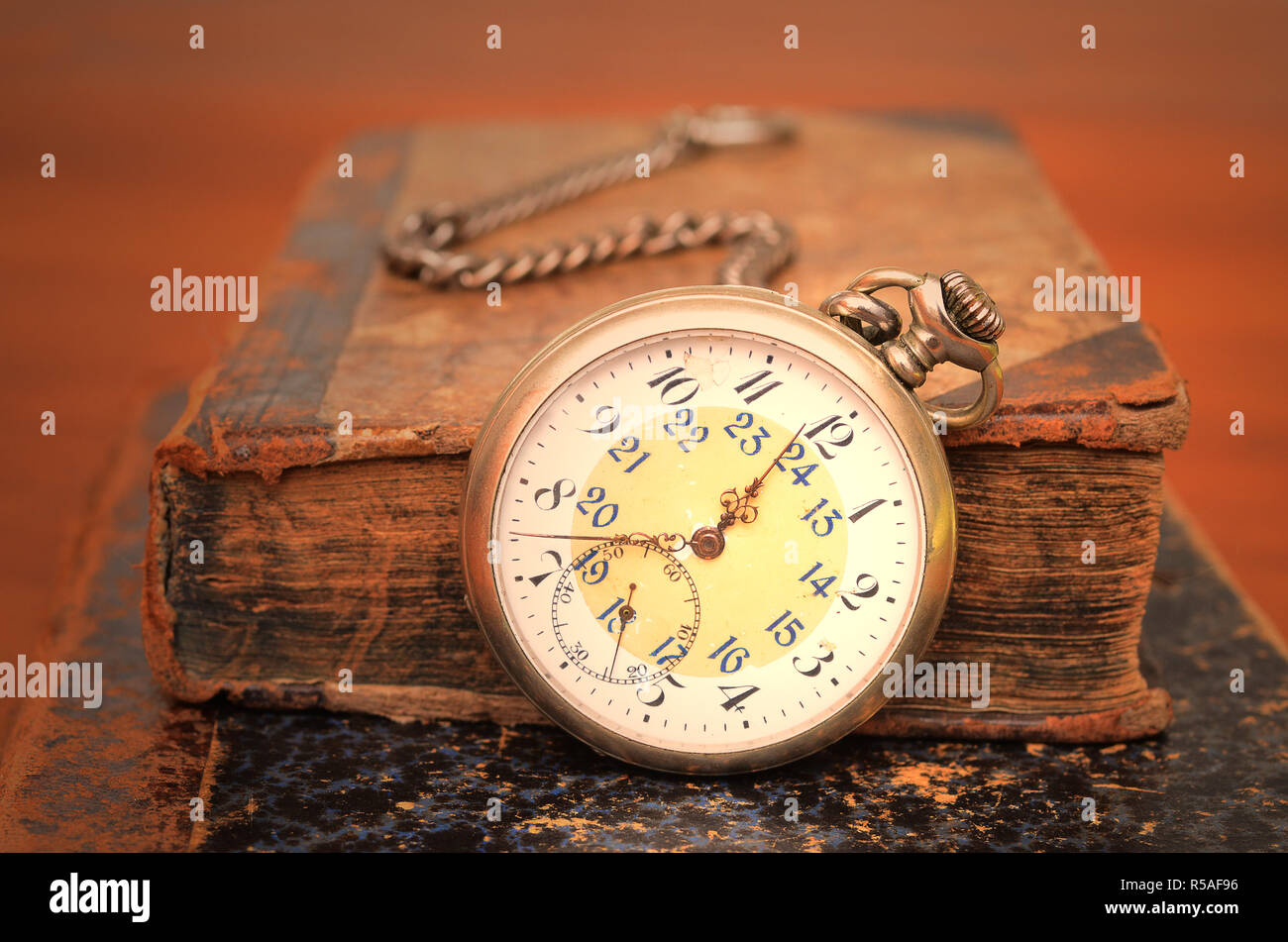 books and old pocket watch Stock Photo - Alamy