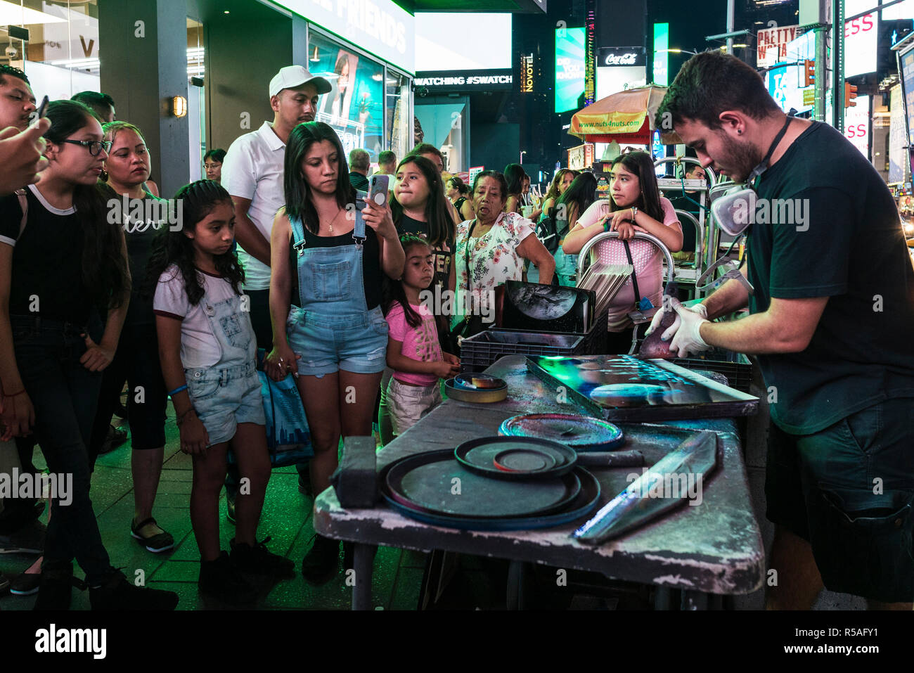 New York City, USA - July 30, 2018: Cartoonist doing a graffiti with ...