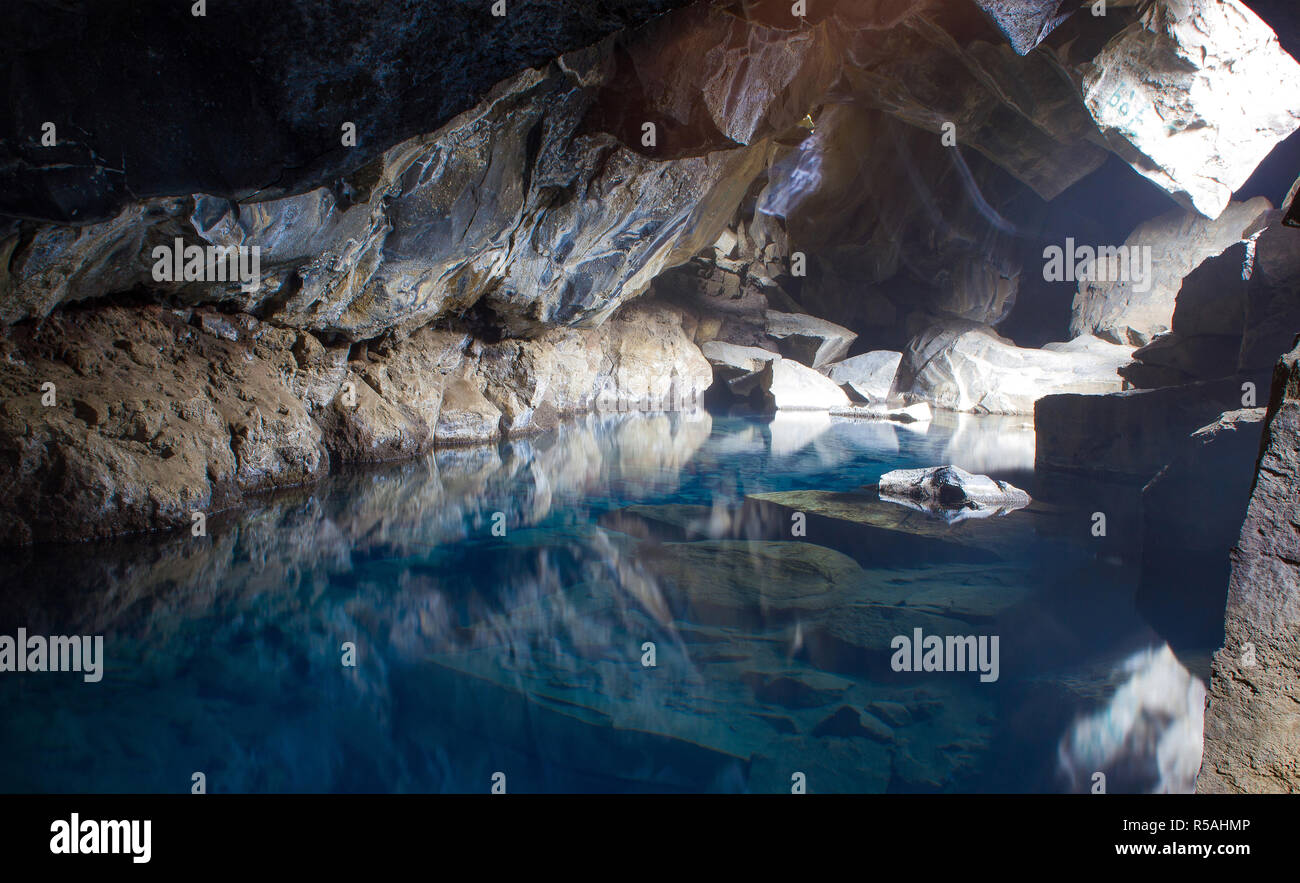 Azure water in hot termal cave, Iceland Stock Photo - Alamy
