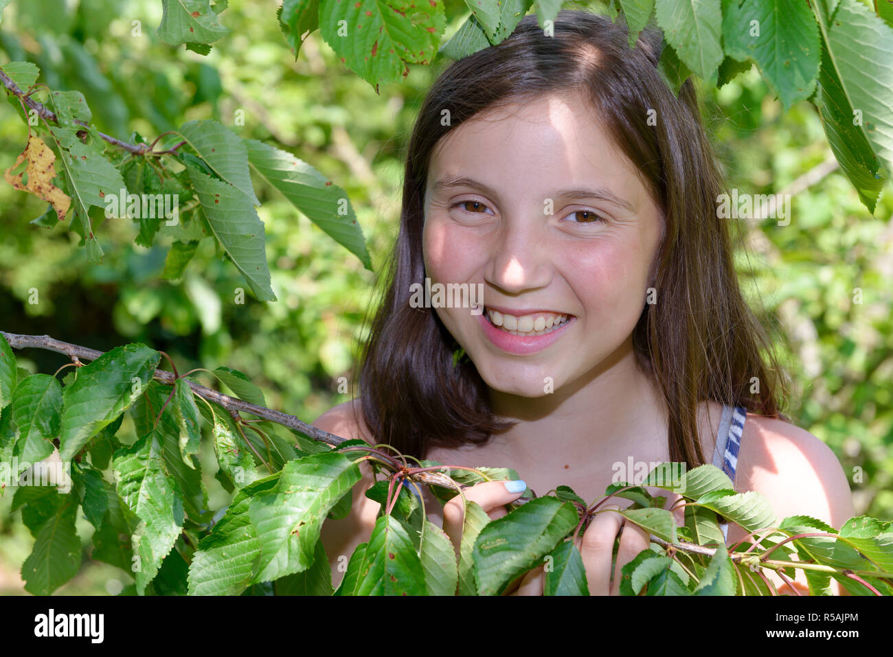 Portrait of beautiful young smiling teen girl, outdoor Stock Photo - Alamy Portrait of beautiful young smiling teen girl, outdoor Stock Photo - Alamy