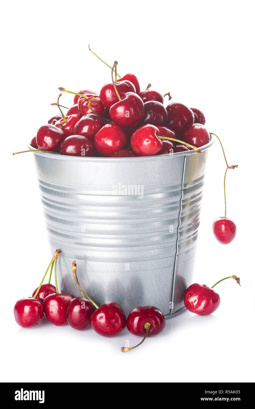 Bucket with cherries isolated on white background Stock Photo - Alamy