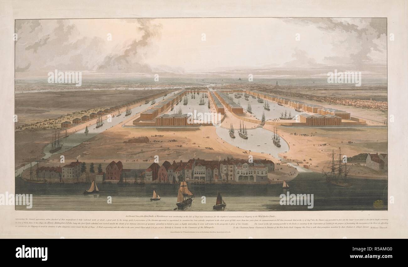 A bird's-eye-view looking over docks in London; the River Thames in the ...