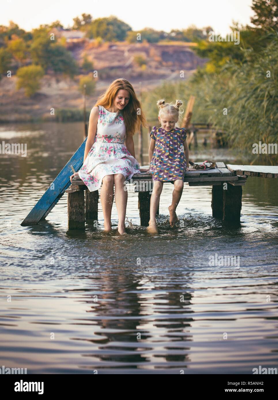 Child Legs Dangling High Resolution Stock Photography and Images - Alamy