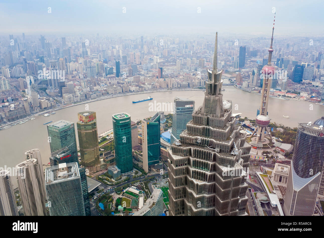 Futuristic Jinmao Tower overlooking the Huangpu river, Bund and ...