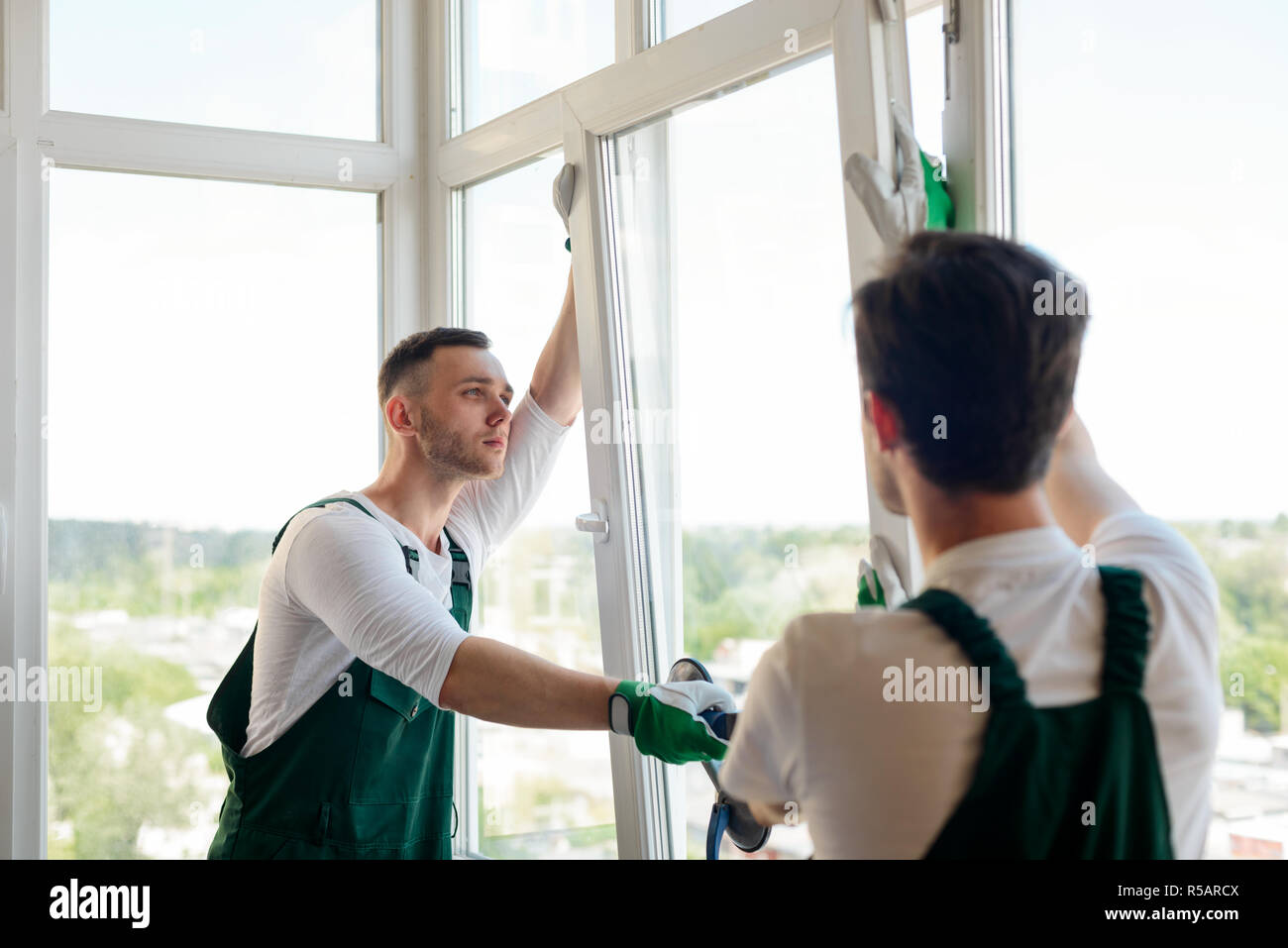 Installing windows hi-res stock photography and images - Alamy