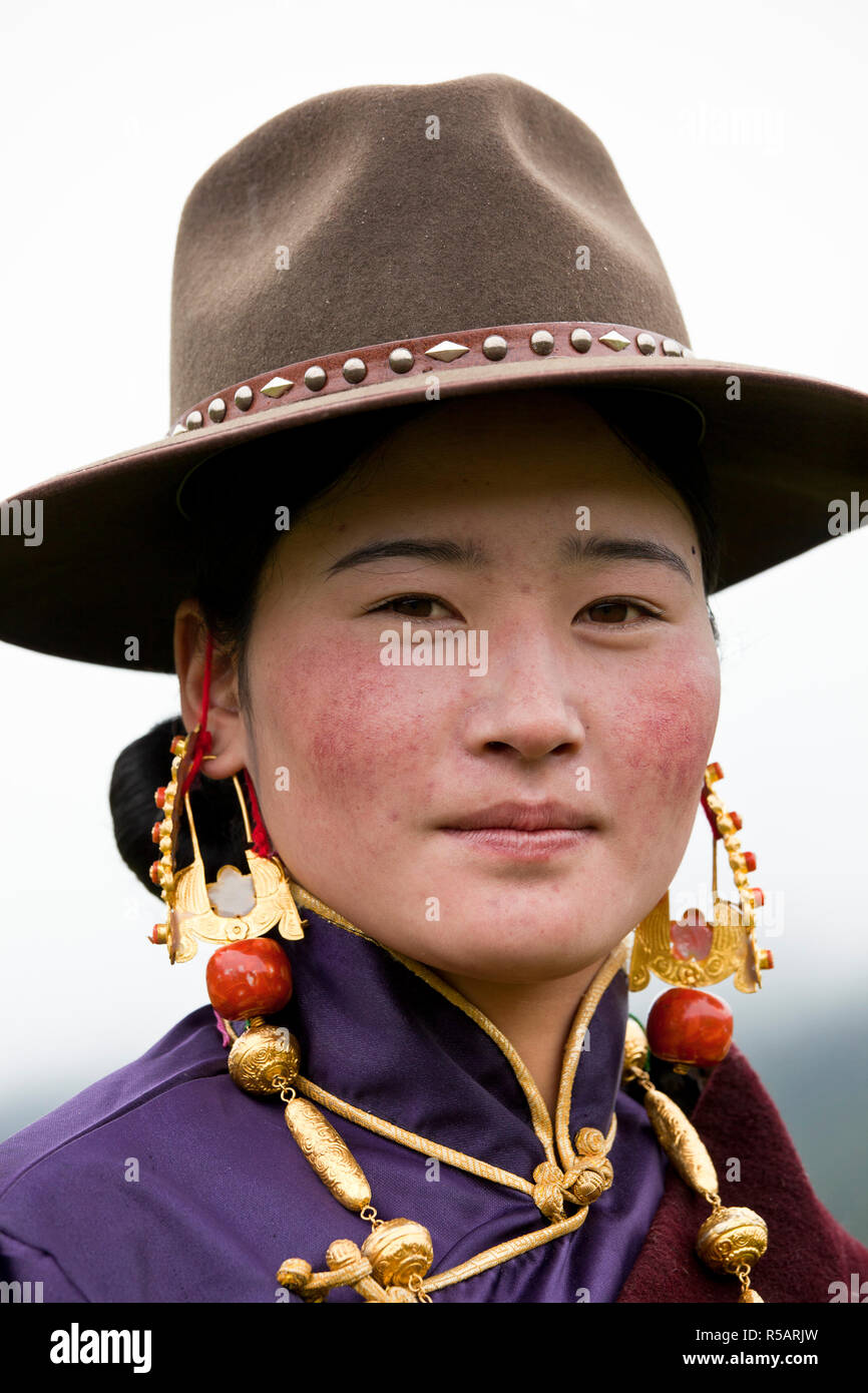 Tibetan woman with horse hi-res stock photography and images - Alamy