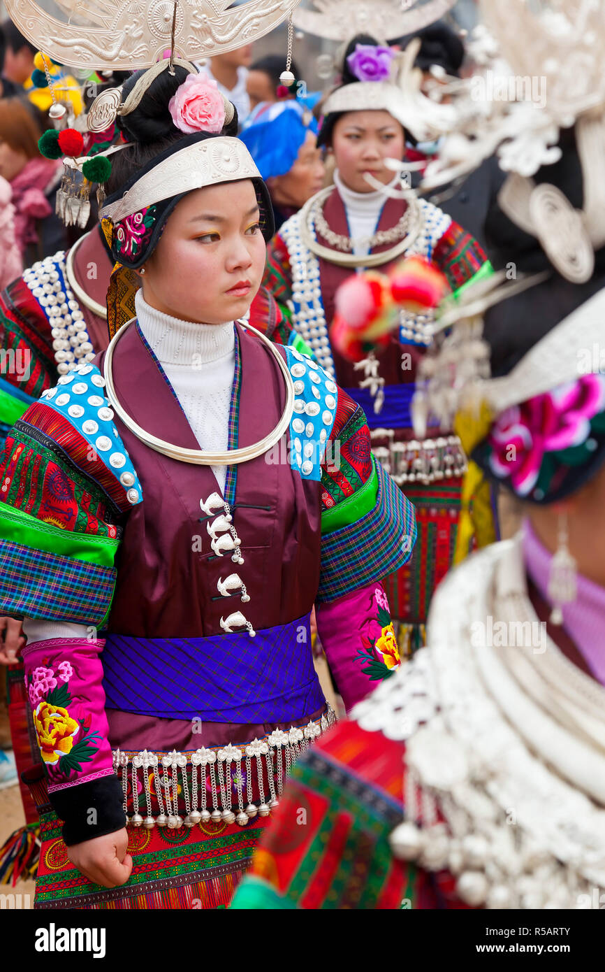 Black Miao girls dancing at festival, Kaili, Guizhou Province, China ...