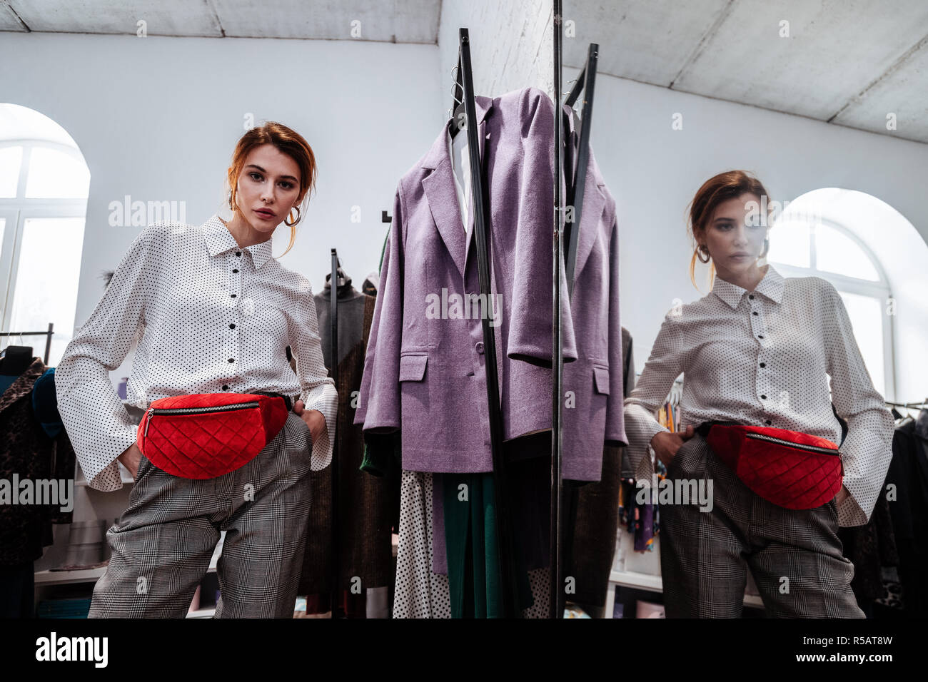 Office jackets. Appealing stylish fashion designer presenting the ...