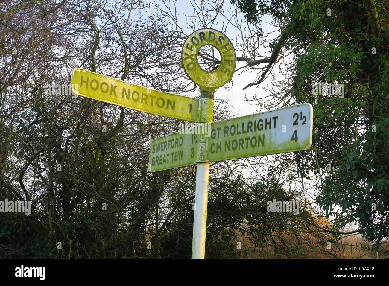 Direction sign leading to the north Oxfordshire village of Hook Norton ...