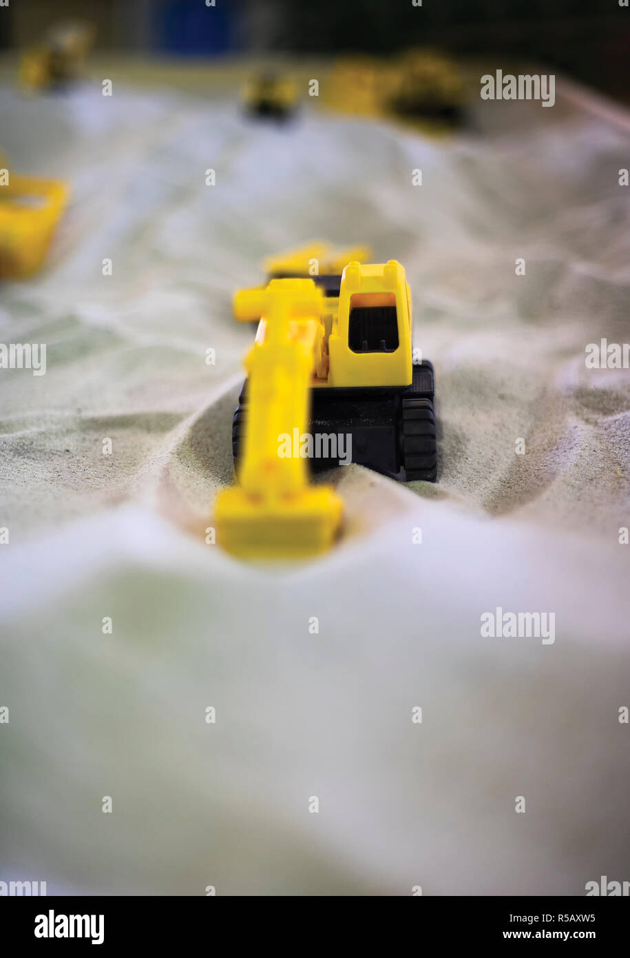 Plastic toy digger Stock Photo - Alamy