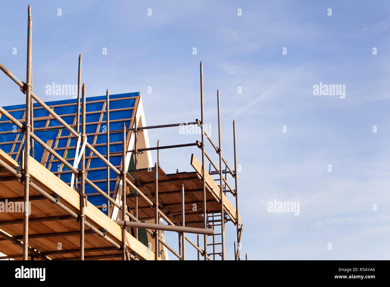 Scaffolding near a roof with copy-space in the Netherlands Stock Photo ...