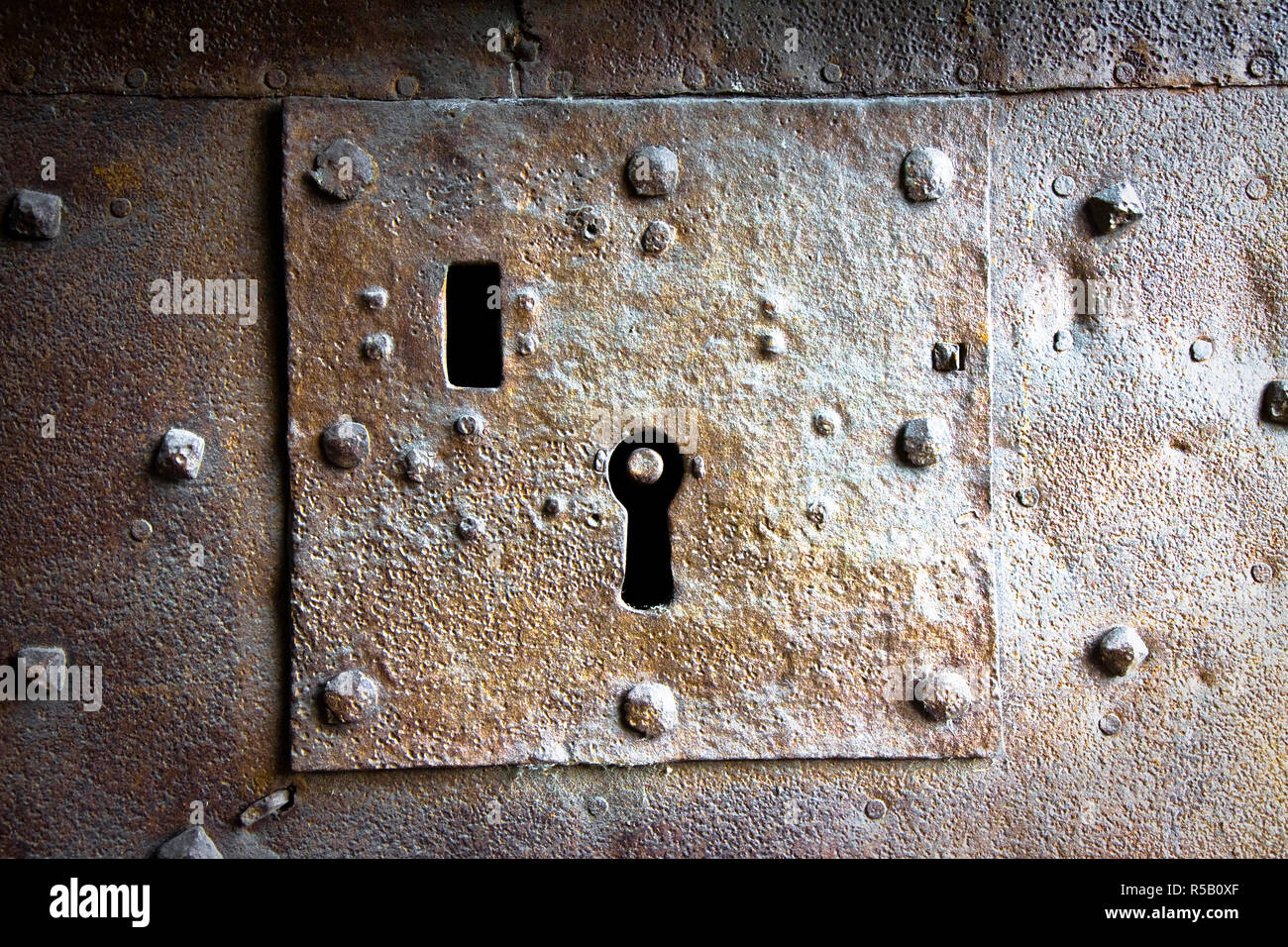 Detail of an old medieval keyhole - concept image Stock Photo - Alamy