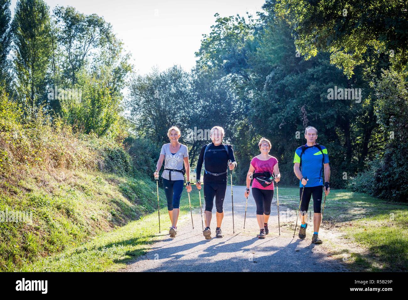 Senior group walking outside hi-res stock photography and images - Alamy