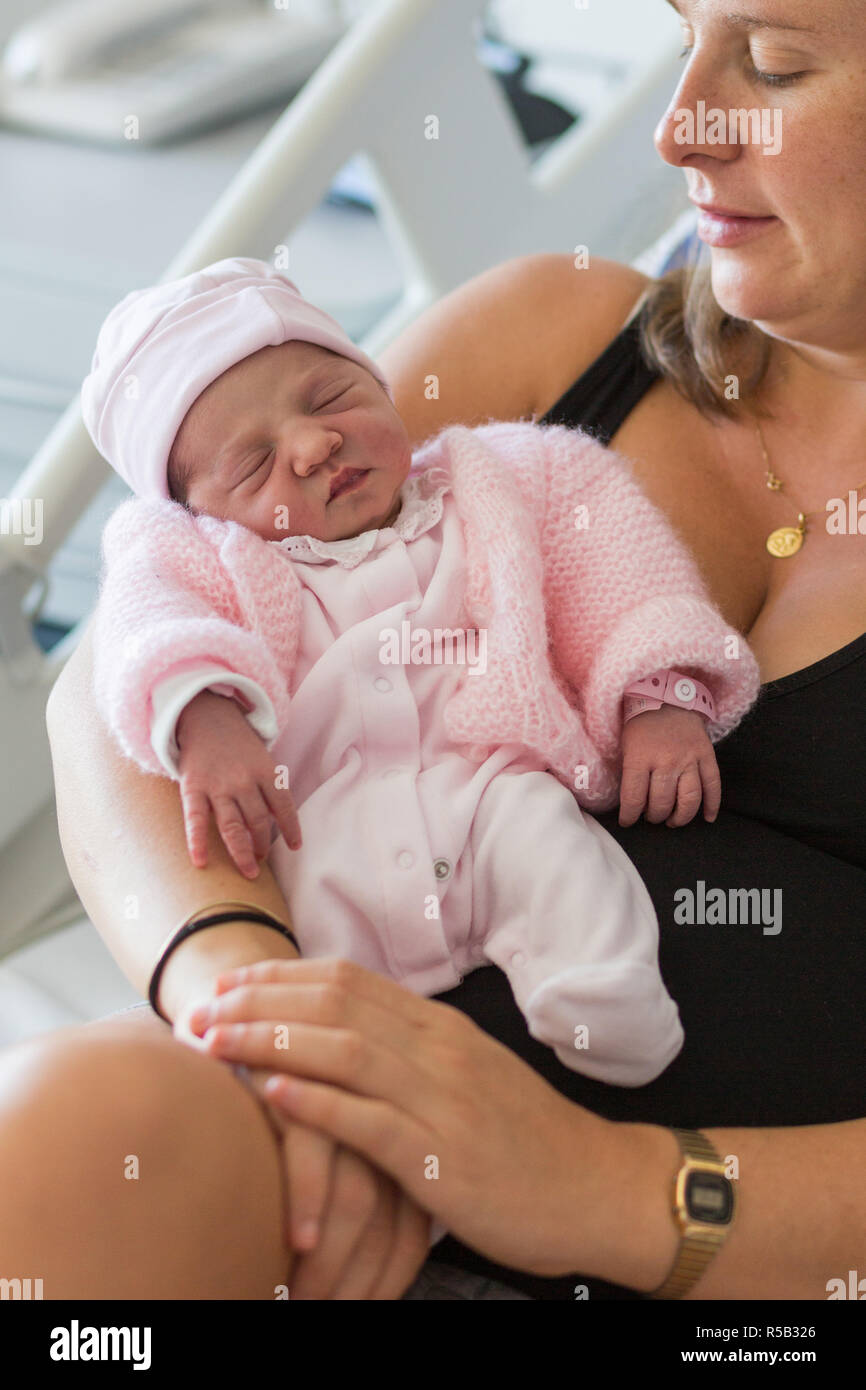 Mother with her one day baby girl Stock Photo - Alamy