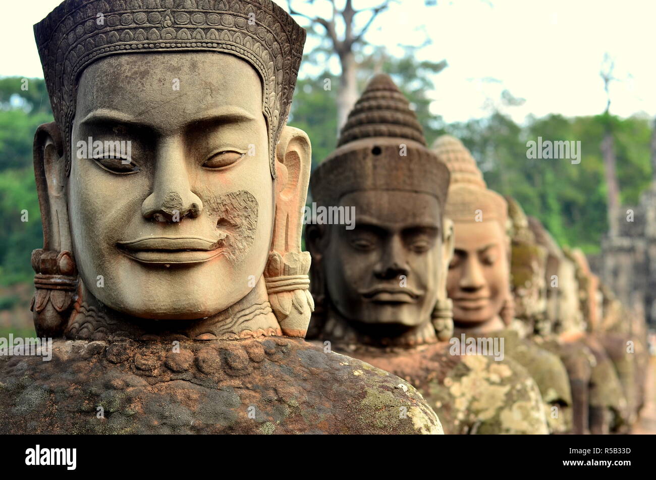 Ancient devas statues carved out of stones depicting the scene of Samudra Manthan at the south ...