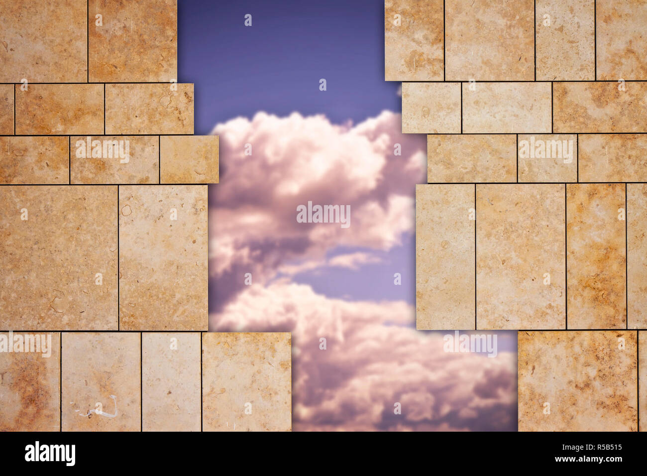 Through a open modern stone wall you can see the sky - freedom concept ...