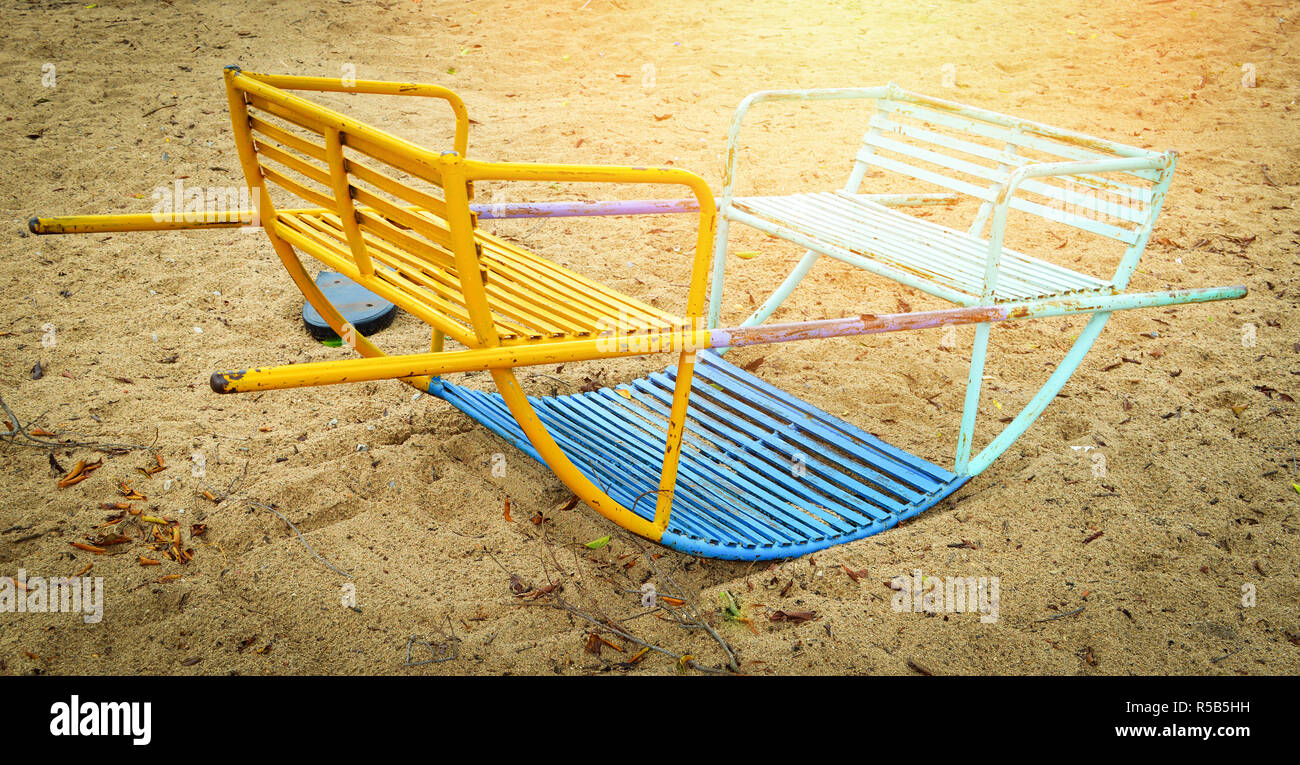 Child rocking on the bench hi-res stock photography and images - Alamy