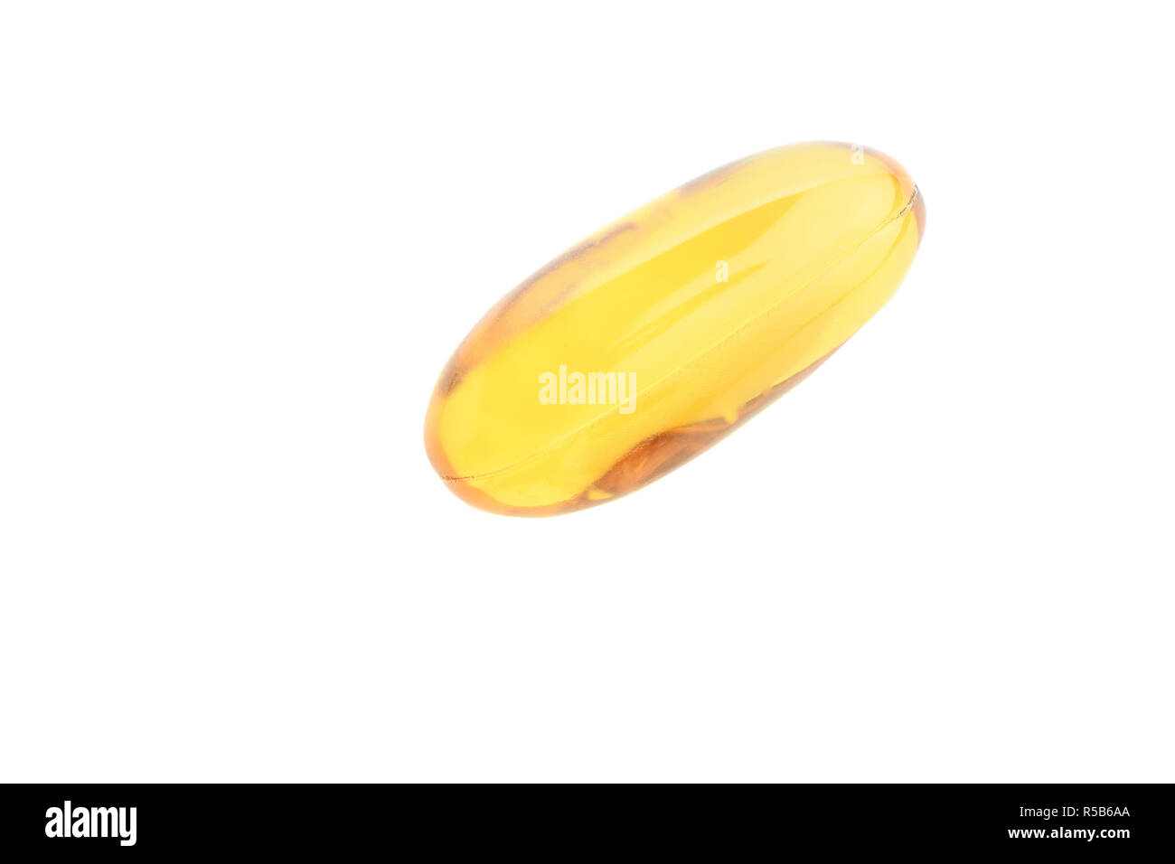 Medicine: Close up of Omega 3 Capsule Isolated on White Background ...