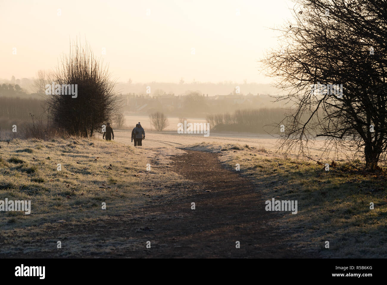 Two walkers on a path through the fields around Silsoe, Bedfordshire ...