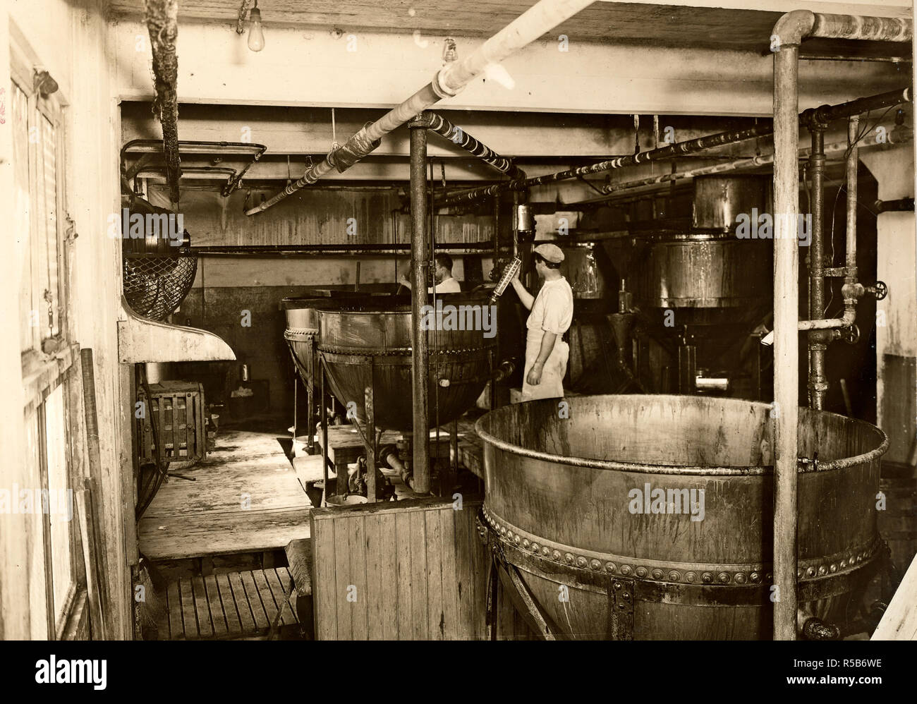 Early 1900s making candy hi-res stock photography and images - Alamy