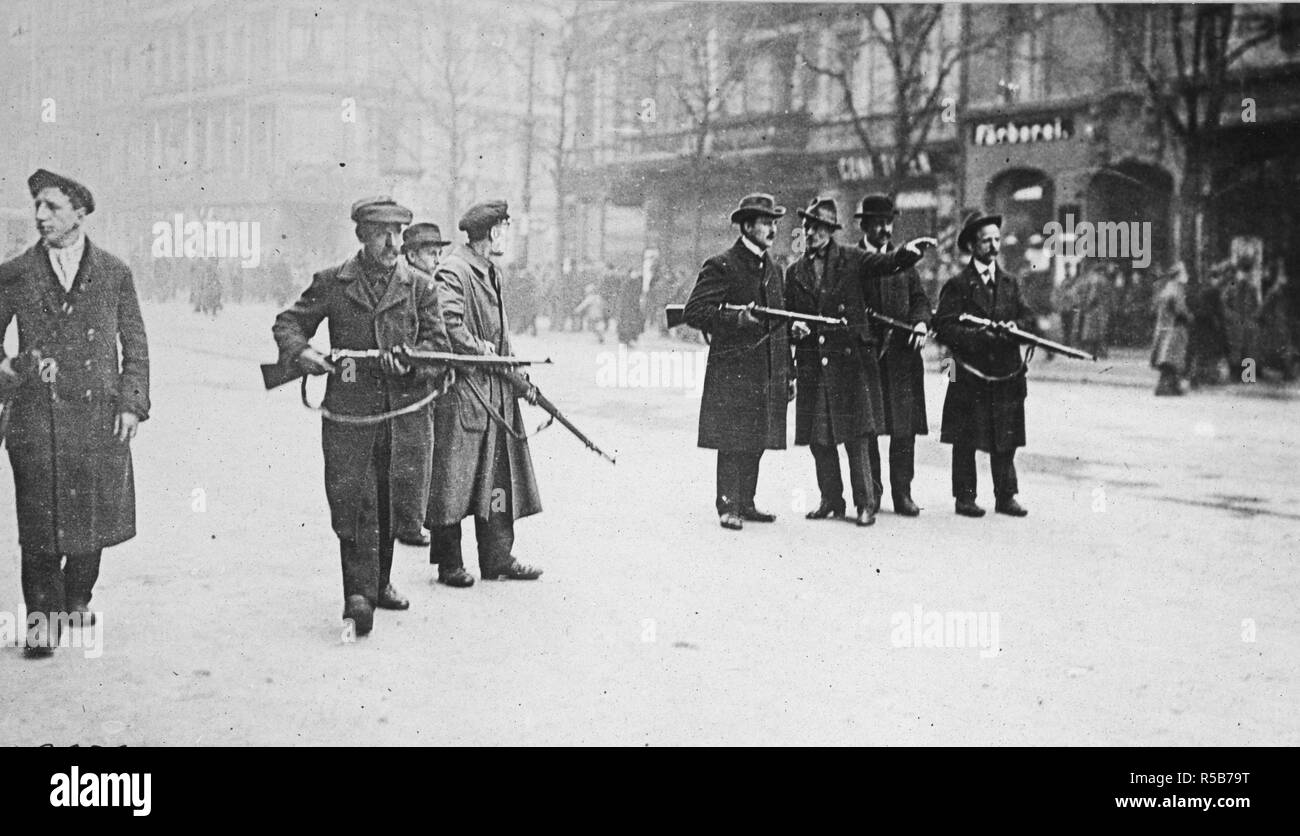 German Revolution - Spartacan and Government troops fighting in streets ...