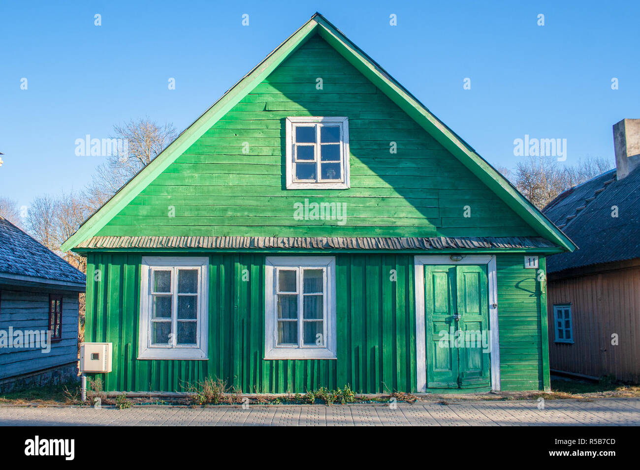 Old lithuanian green wooden house with three windows in Trakai, Vilnius ...