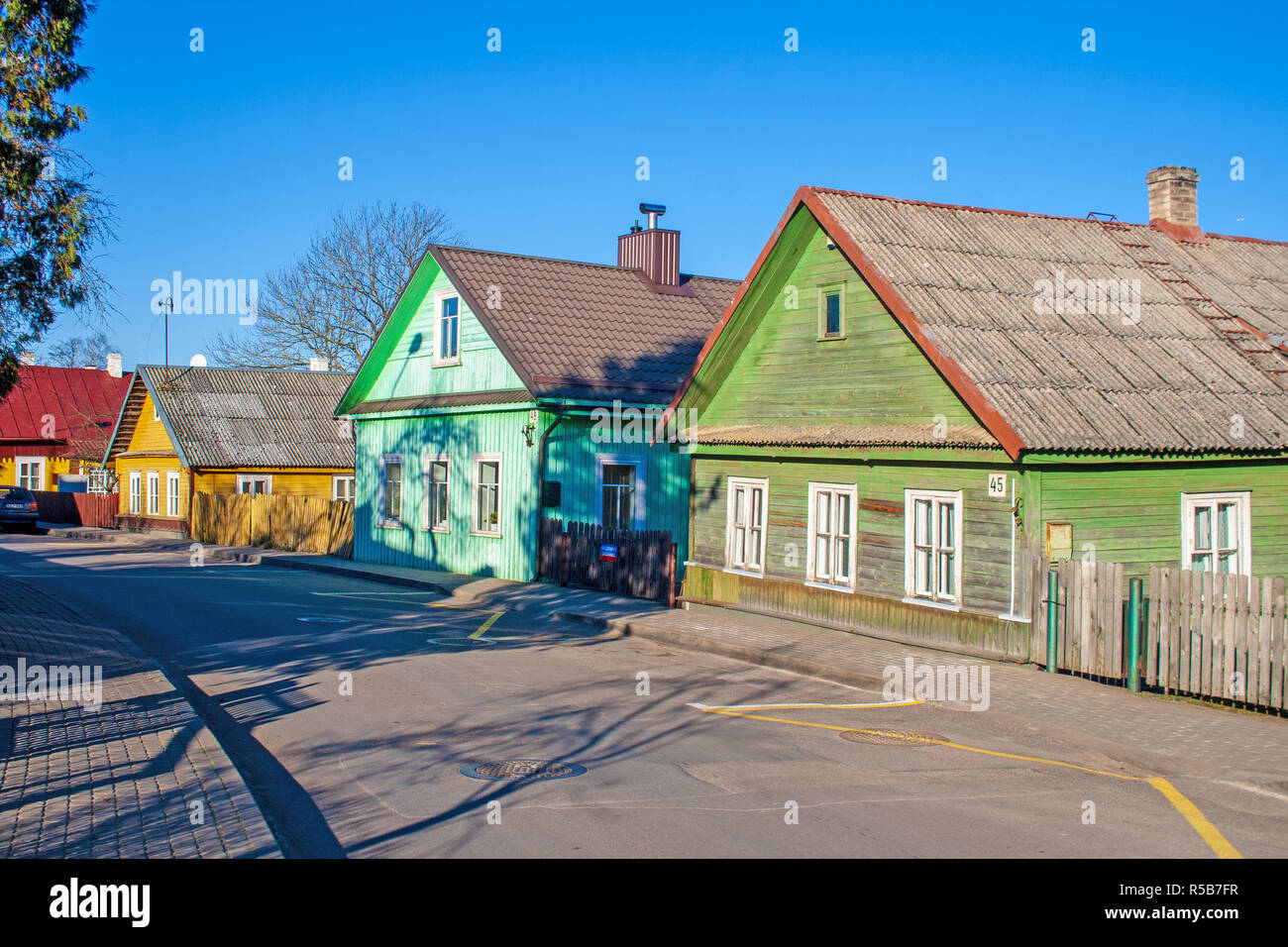 Old Lithuanian traditional wooden houses with three windows Stock Photo ...
