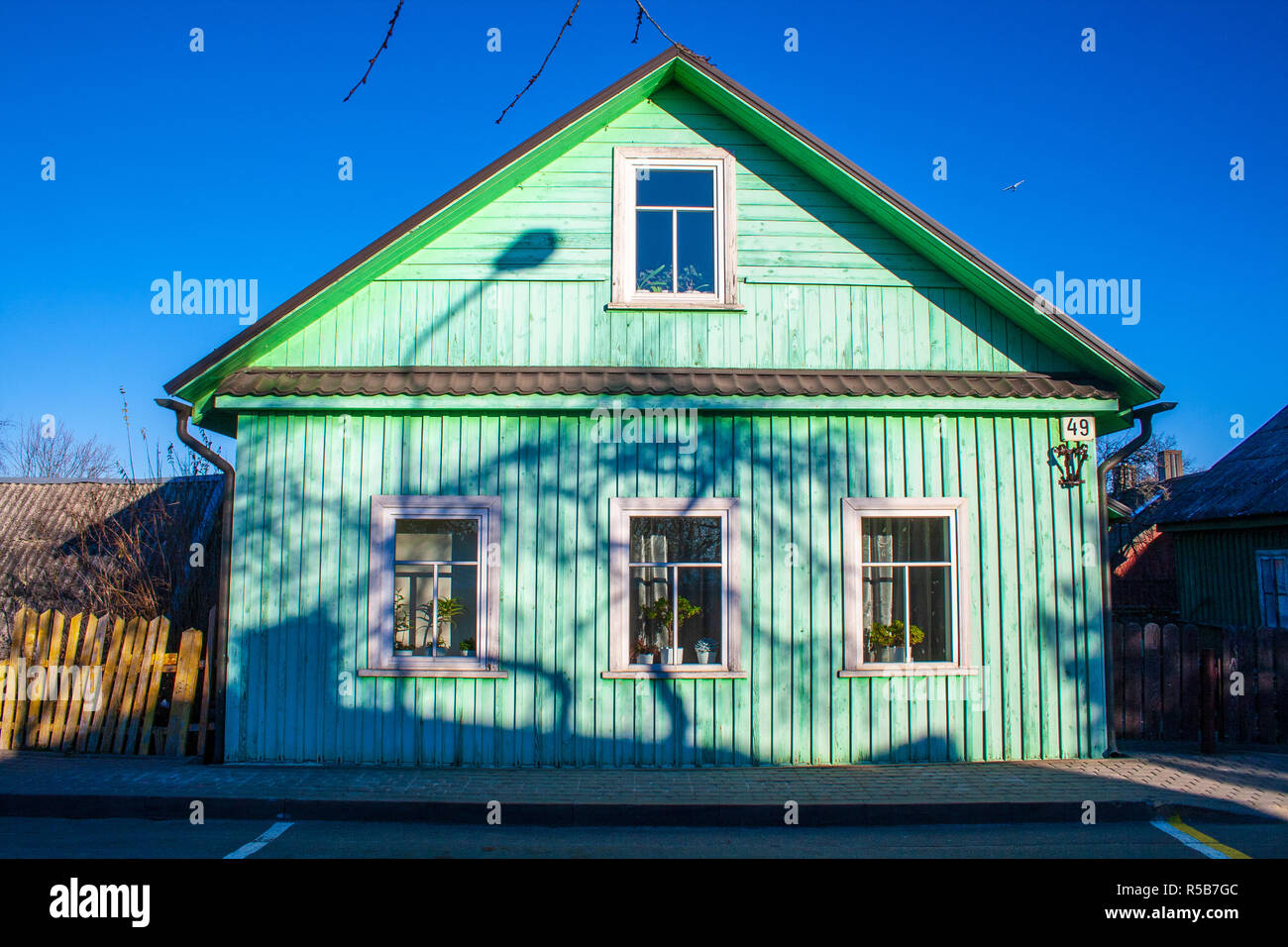 Old lithuanian green wooden house with three windows in Trakai, Vilnius ...