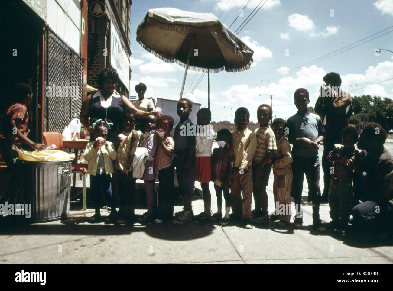 1973 - Ghetto Black Children Line Up For Snow Cones From A Sidewalk ...