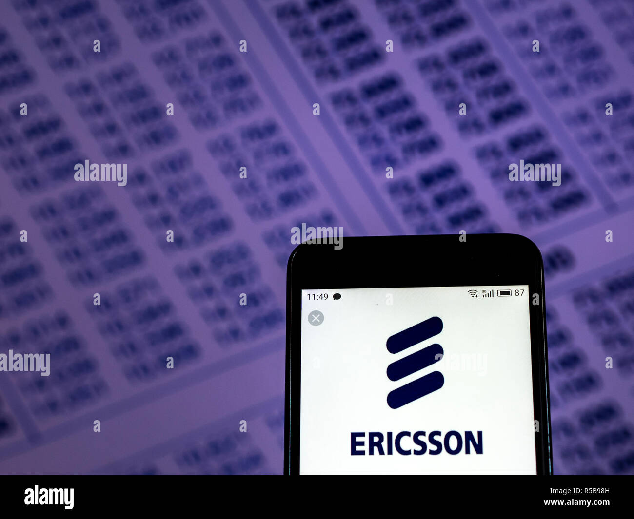 Ericsson Telecommunications company logo seen displayed on smart phone ...