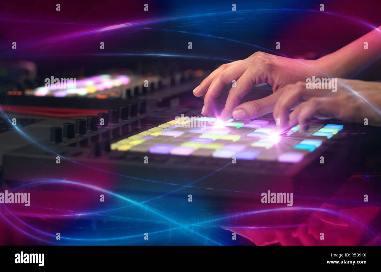 Hand mixing music on midi controller with wave vibe concept Stock Photo ...