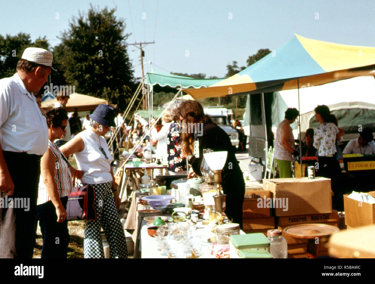 Flea market browsers at white cloud hi-res stock photography and images ...