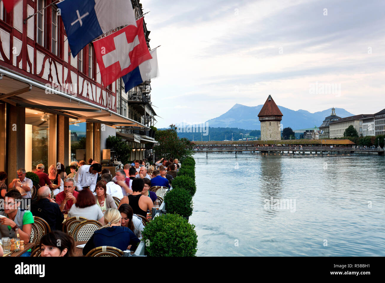 Switzerland, Lucern (Luzern), outdoor cafes along River Reuss Stock ...