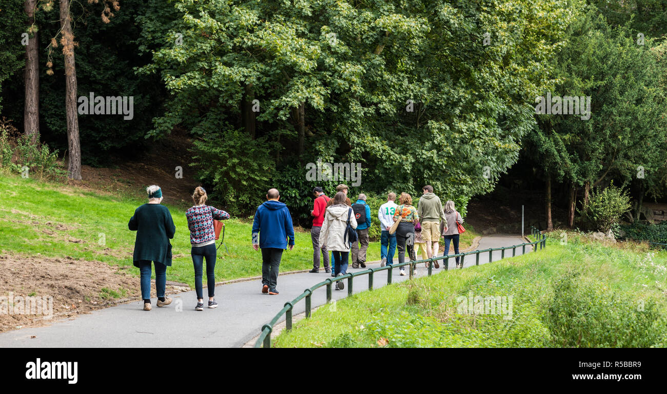 Local tourists following a guide in the Josaphat park Stock Photo - Alamy