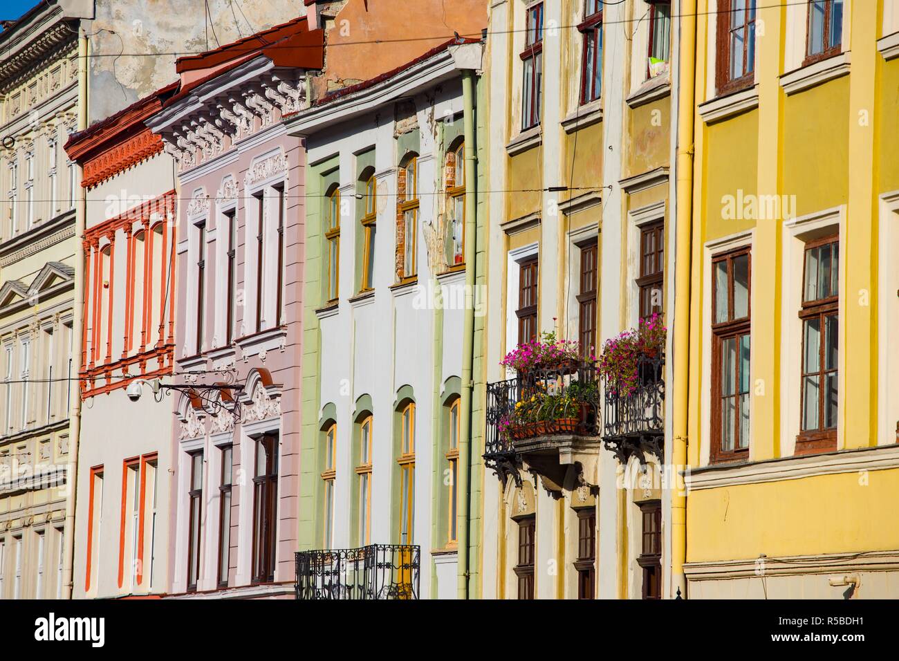 colorful facades of old buildings at the main square of beautiful town ...