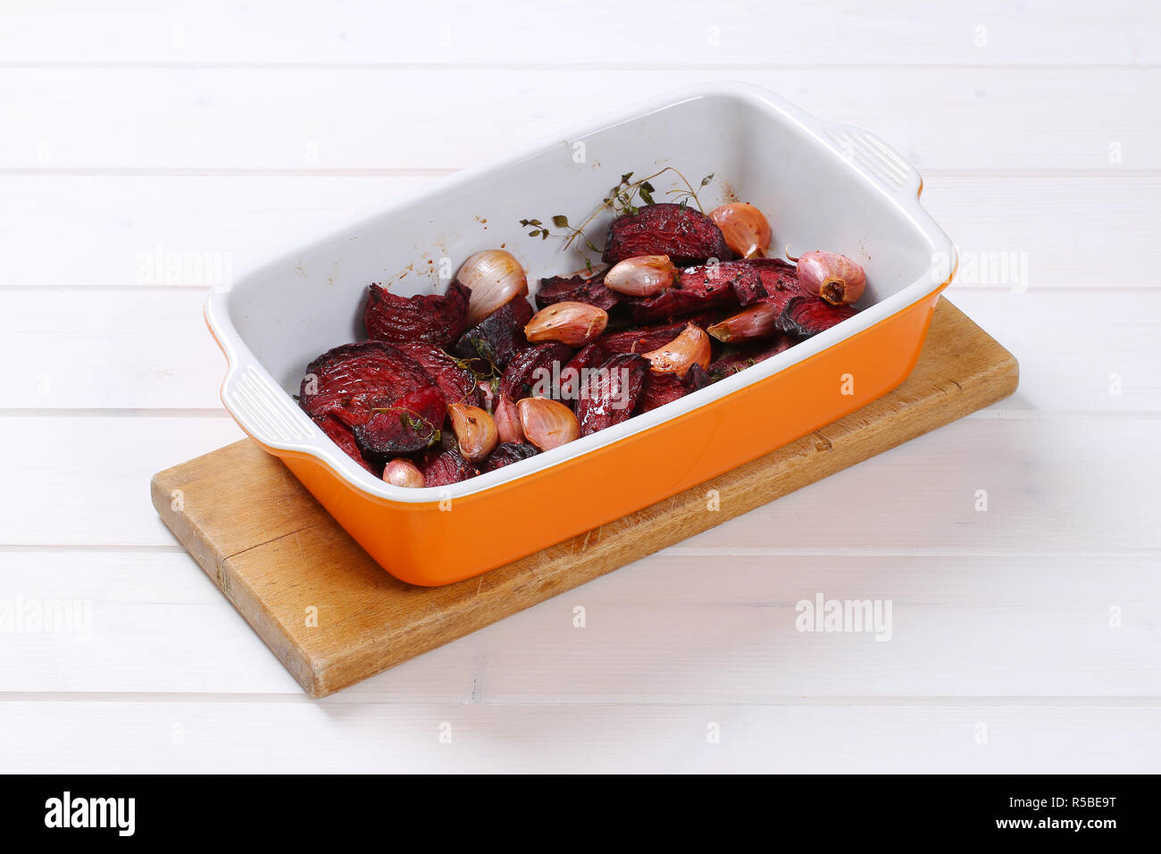 baked beetroot with garlic Stock Photo - Alamy