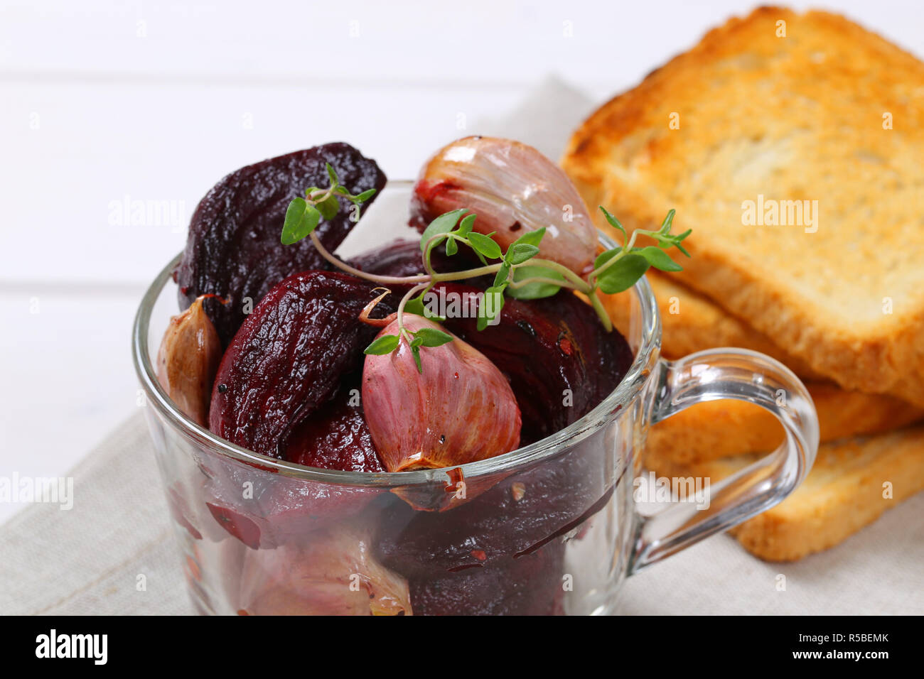 baked beetroot and garlic with toast Stock Photo - Alamy