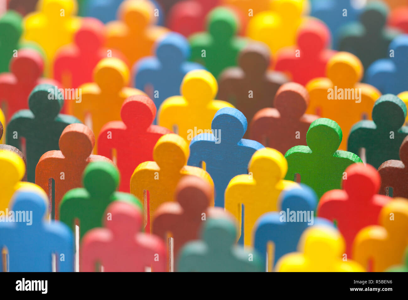 Colorful painted group of people figures Stock Photo - Alamy