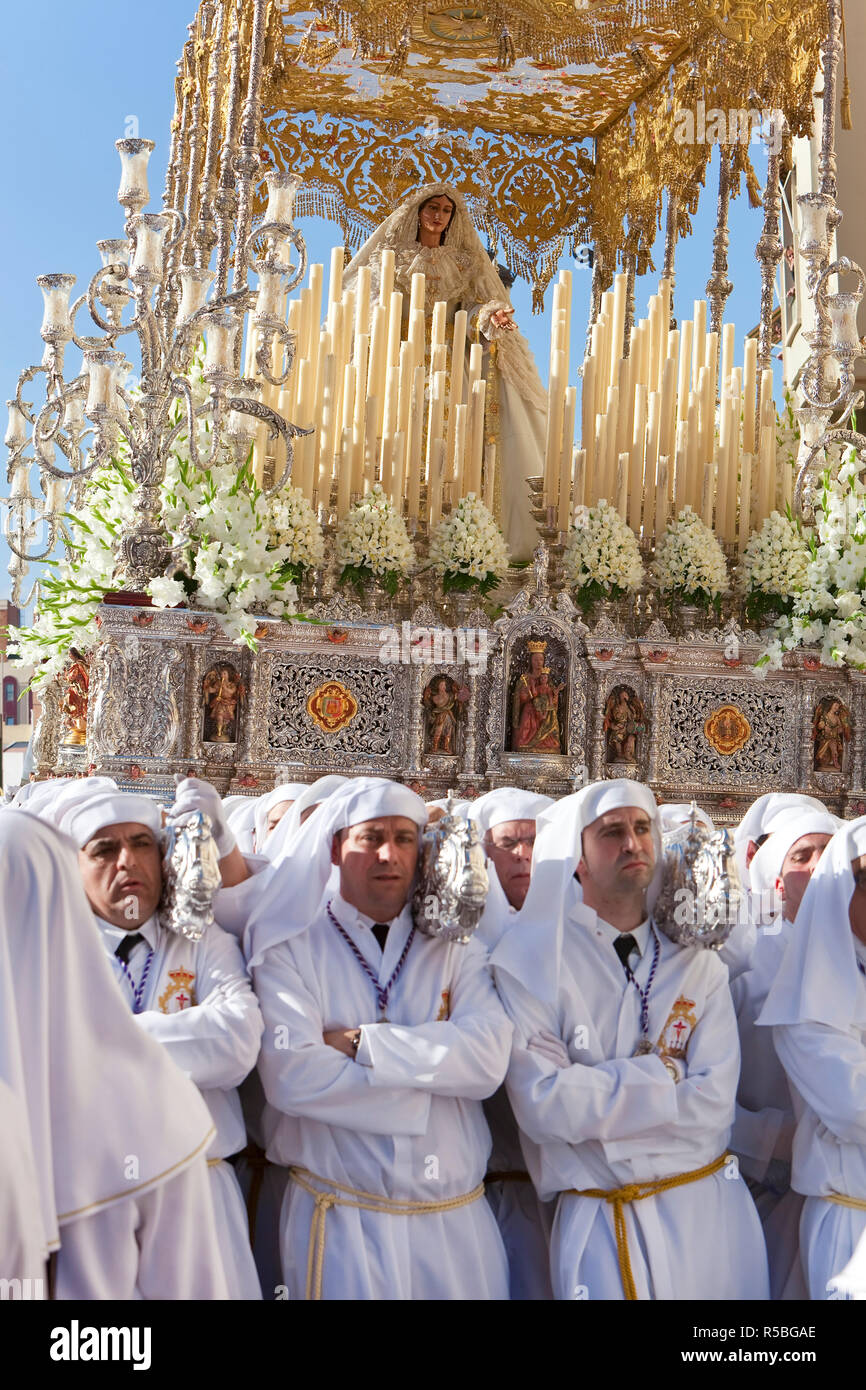 Religious float being carried through the streets during Semana Santa ...