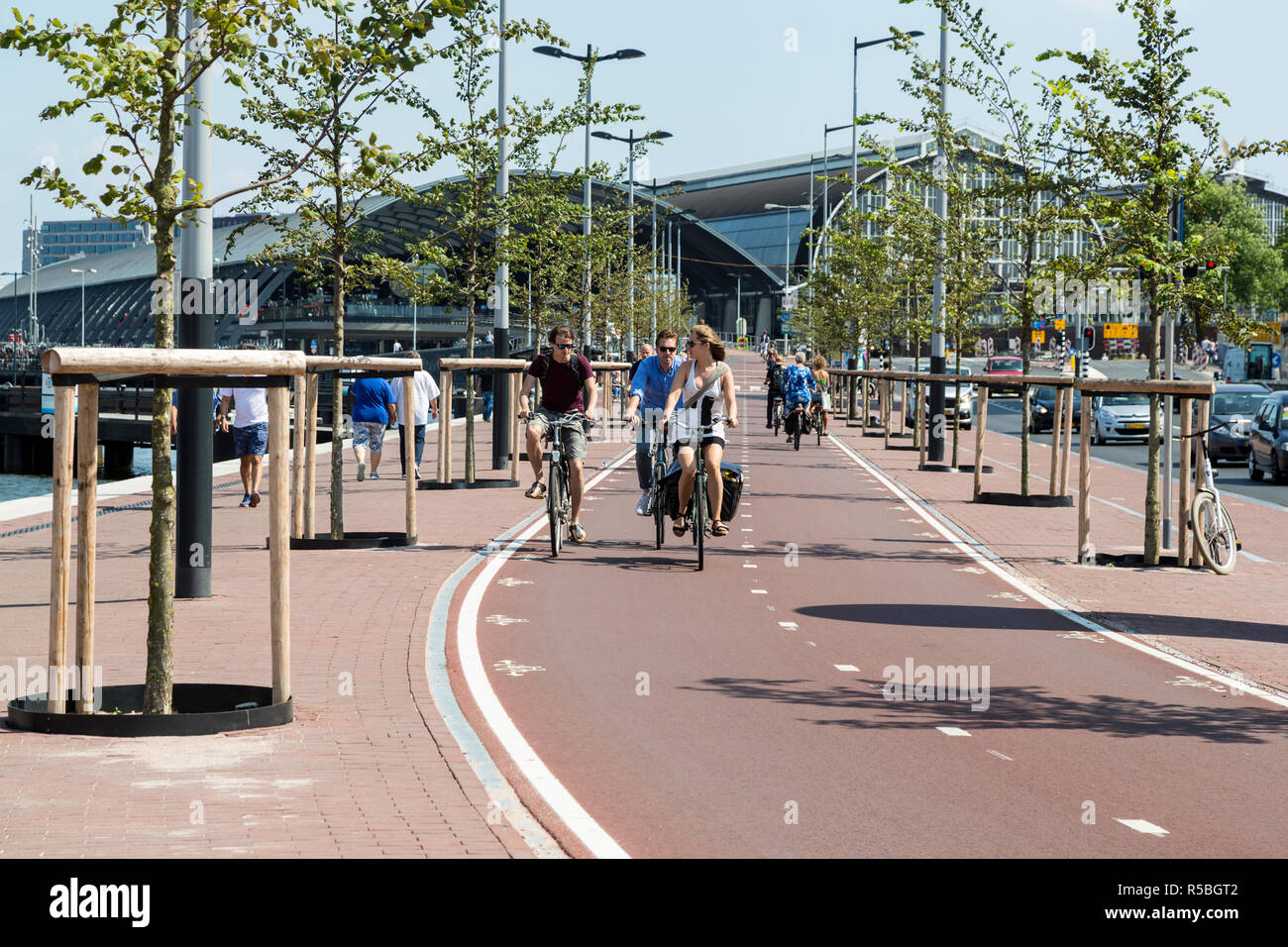 Amsterdam, The Netherlands. Commuters Using Bicycle Lane for Riding ...