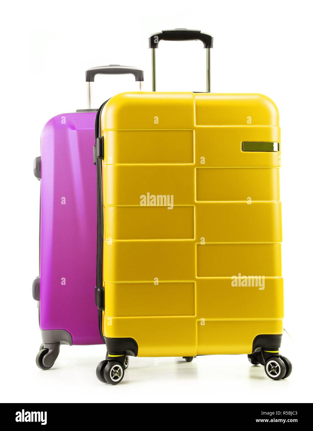 Five plastic suitcases isolated on white Stock Photo - Alamy